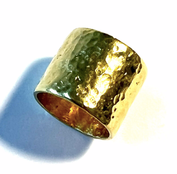 18k yellow gold hand made hammered finish band. Sz 4 1/2. 11.8grams ...